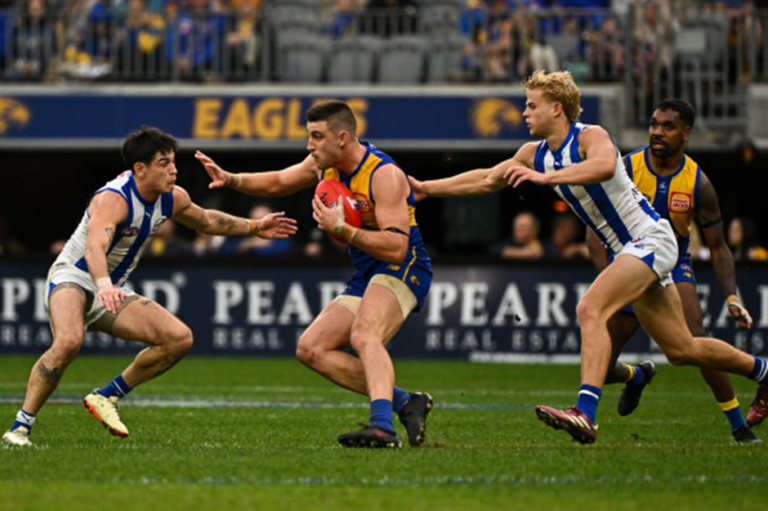 What is the new AFL holding the ball interpretation and what does it ...